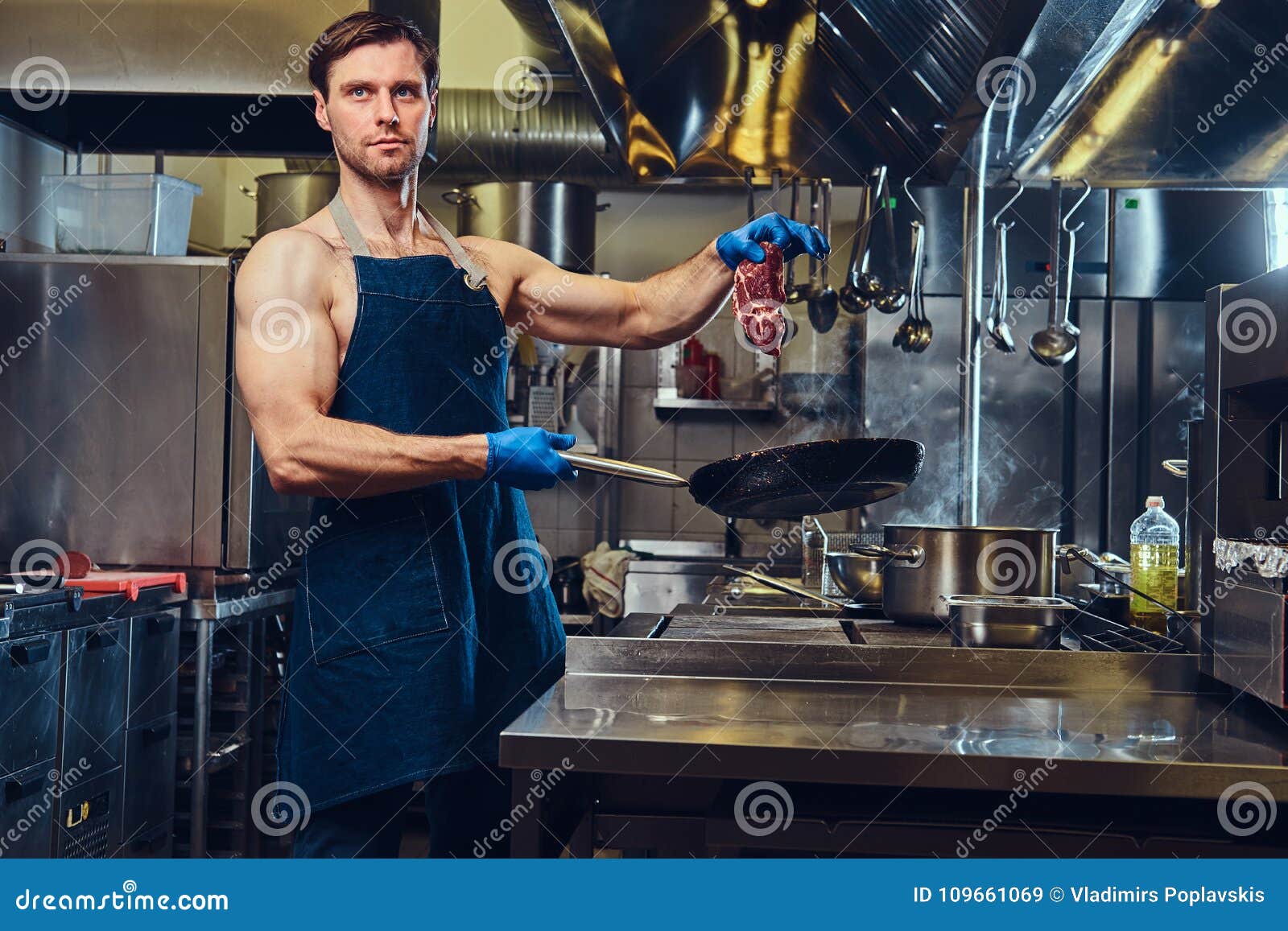 The chef in a kitchen. stock image. Image of lamb, interior - 109661069