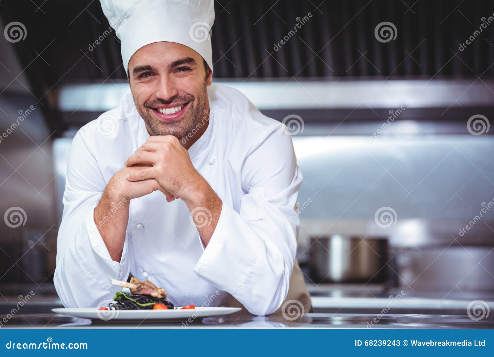 Chef Leaning on the Counter with a Dish Stock Image - Image of ...