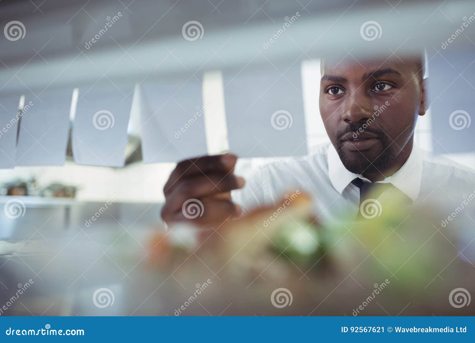 Chef Looking at an Order List in the Commercial Kitchen Stock Image ...