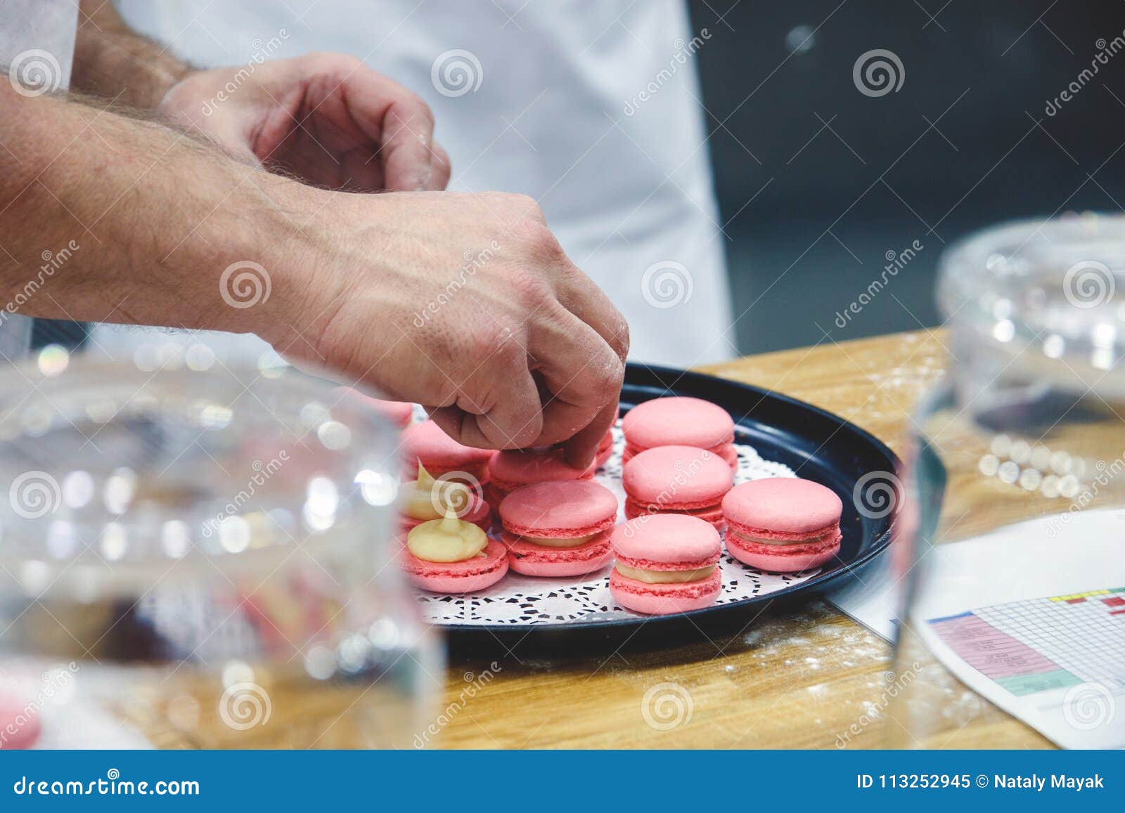 Chef with Macaroons on Tray at Bakery Stock Image - Image of glove ...