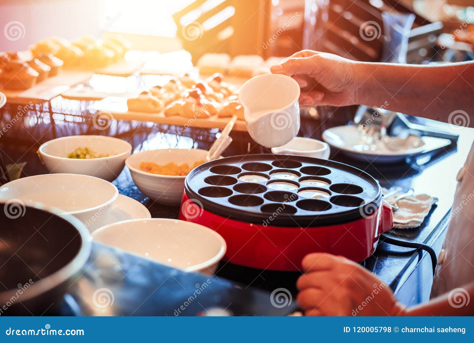 The Chef Make the Dessert on the Table and Pour Milk. Stock Photo ...