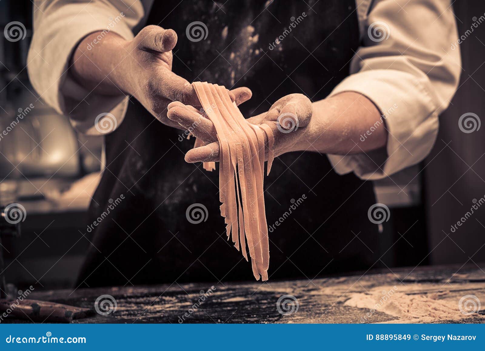 The Chef Makes Fresh Spaghetti from Scratch. Stock Image - Image of ...