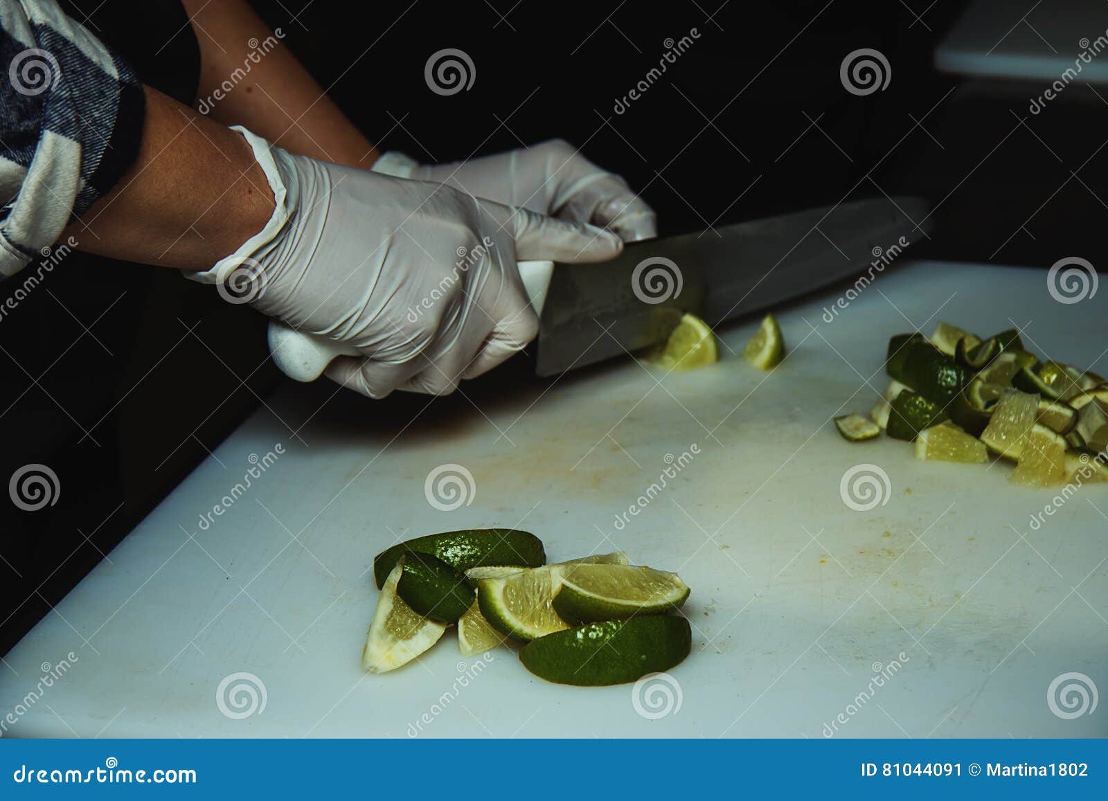 Chef makes lime sliced stock image. Image of activity - 81044091