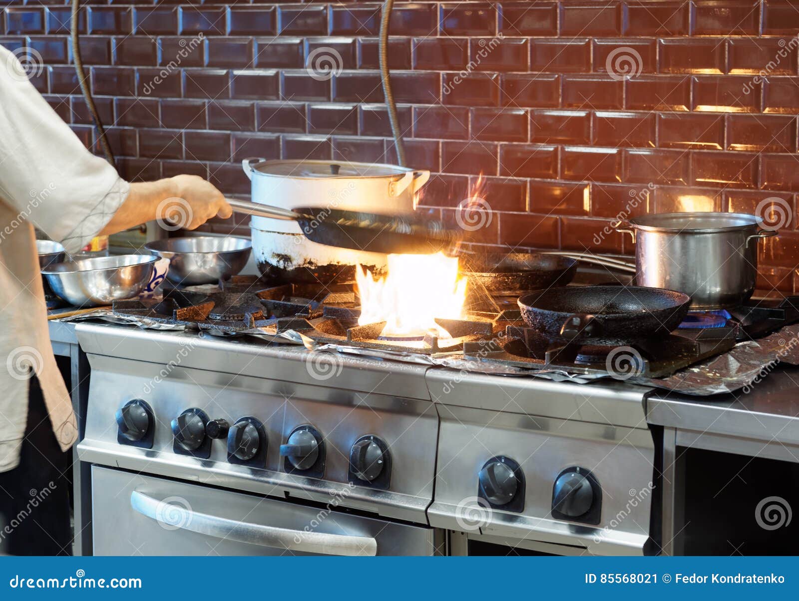 Chef is Making Flambe Dish in Restaurant Kitchen Stock Image - Image of ...