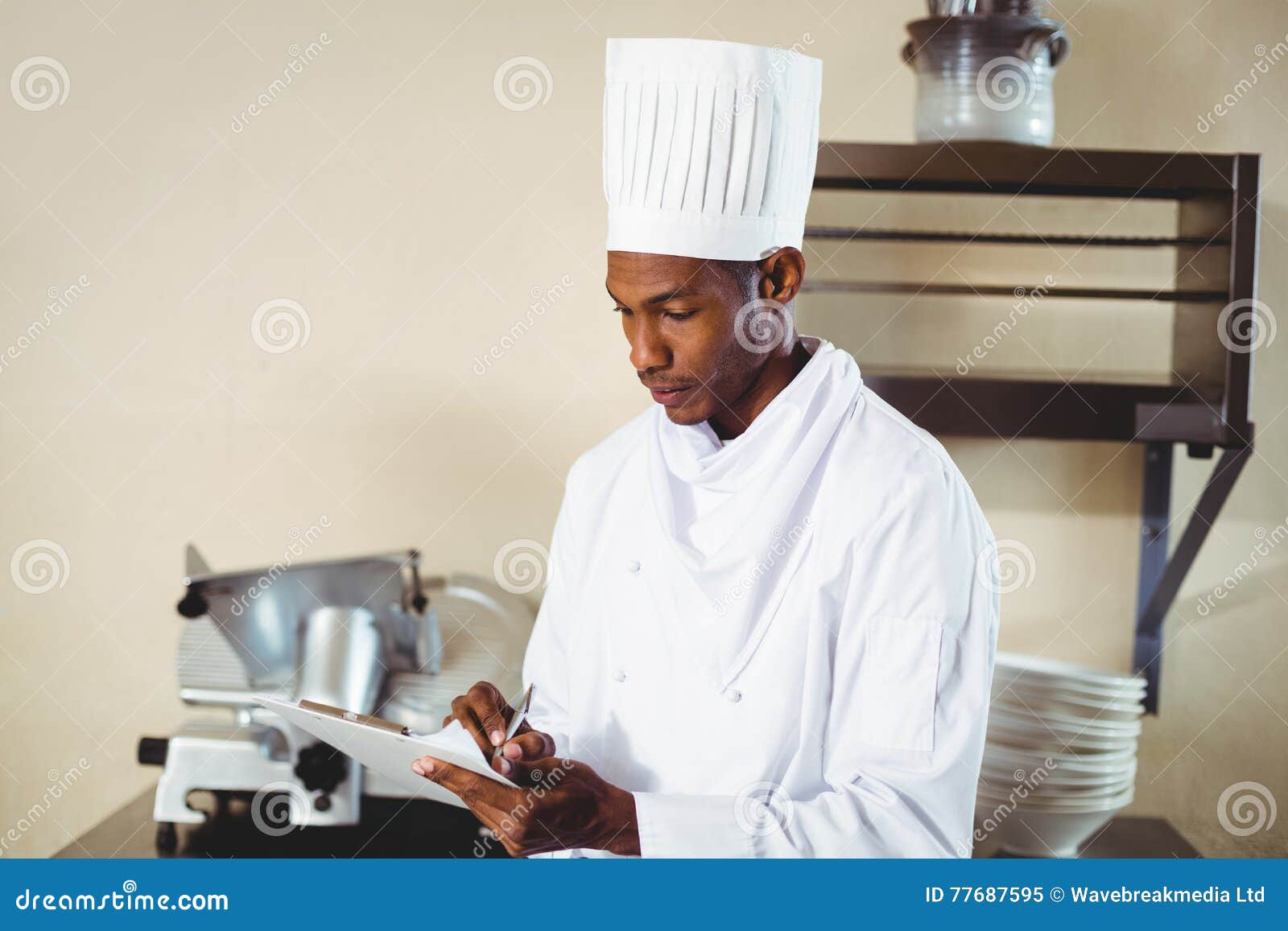 Chef Making Notes on a Clipboard Stock Image - Image of whites, indoors ...