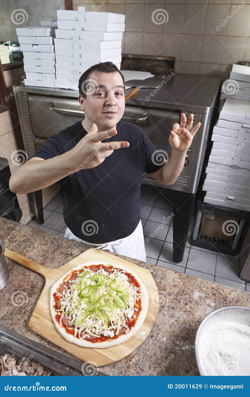 Chef making a pizza stock image. Image of cuisine, owner - 20011629