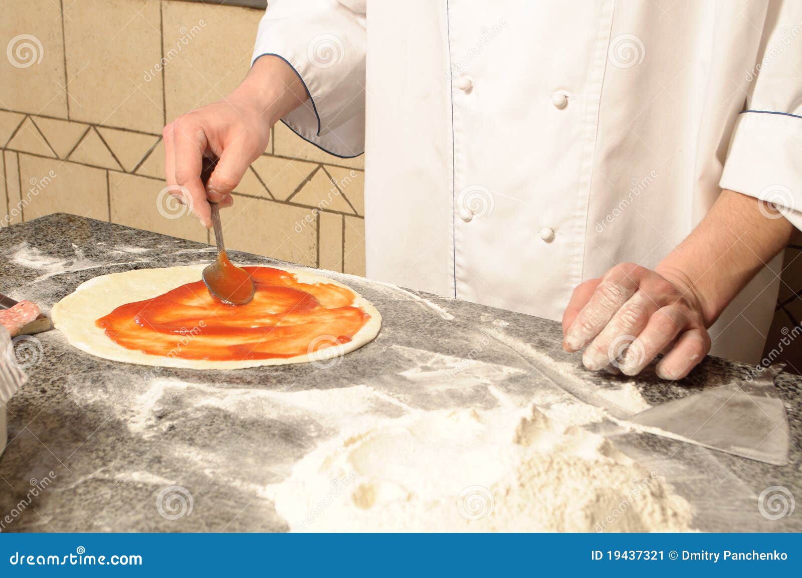 Chef making a Pizza Base stock image. Image of cuisine - 19437321