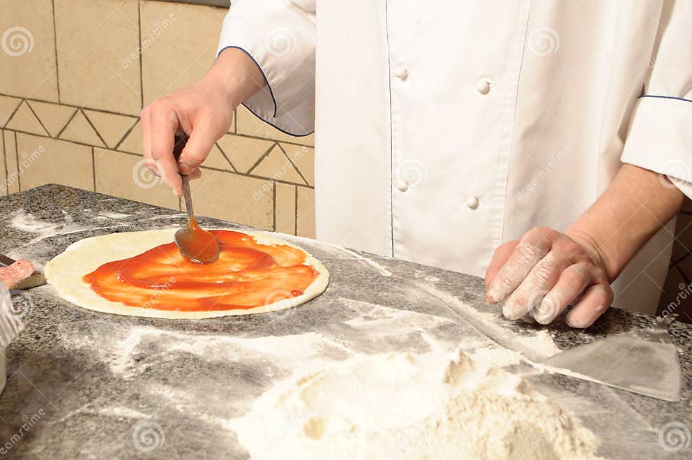 Chef making a Pizza Base stock image. Image of cuisine - 19437321