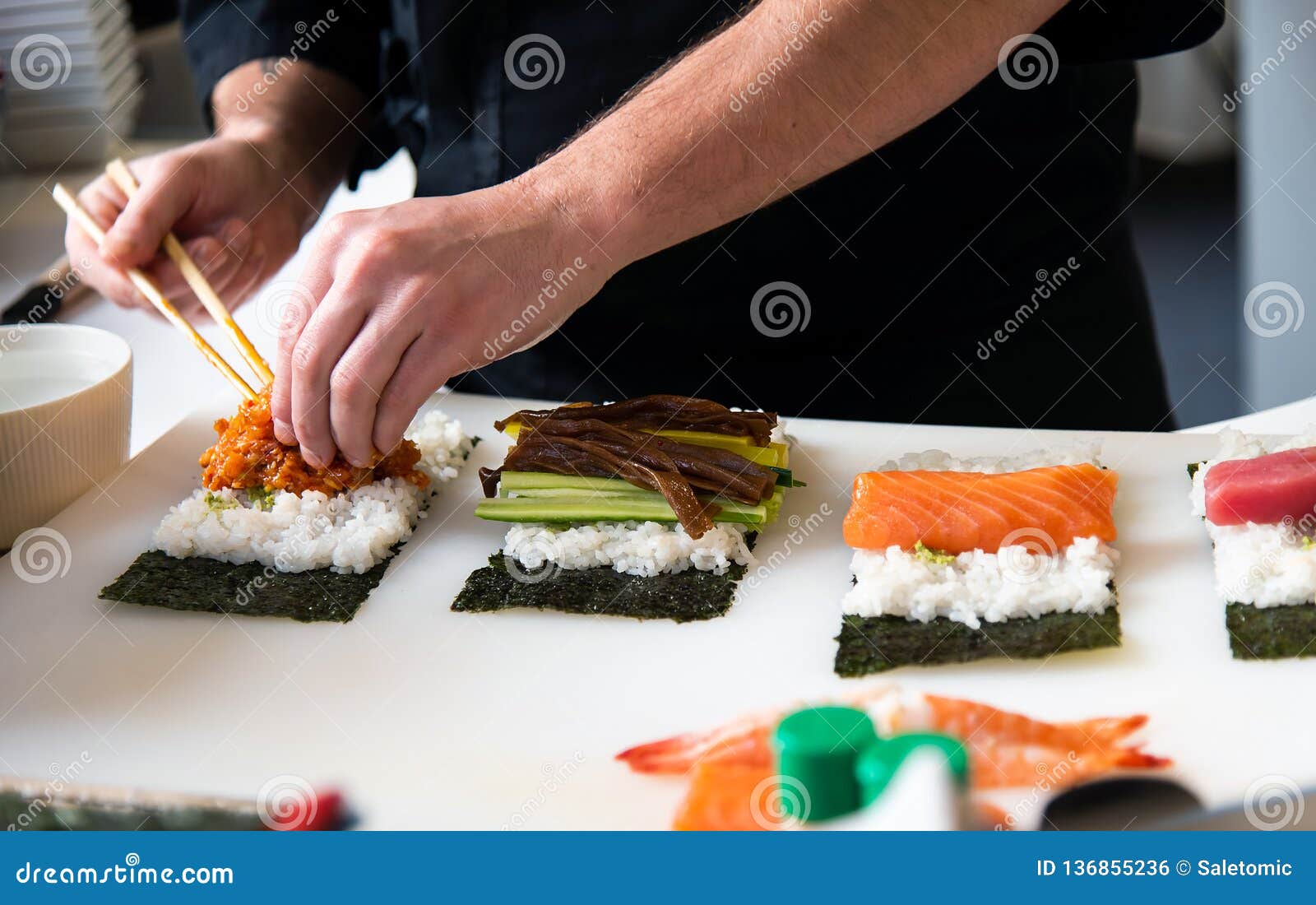 Chef Making Sushi in the Bar Stock Photo - Image of cooking, east ...