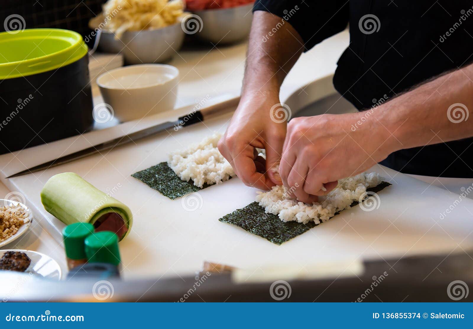 Chef Making Sushi in the Bar Stock Photo - Image of east, avocado ...