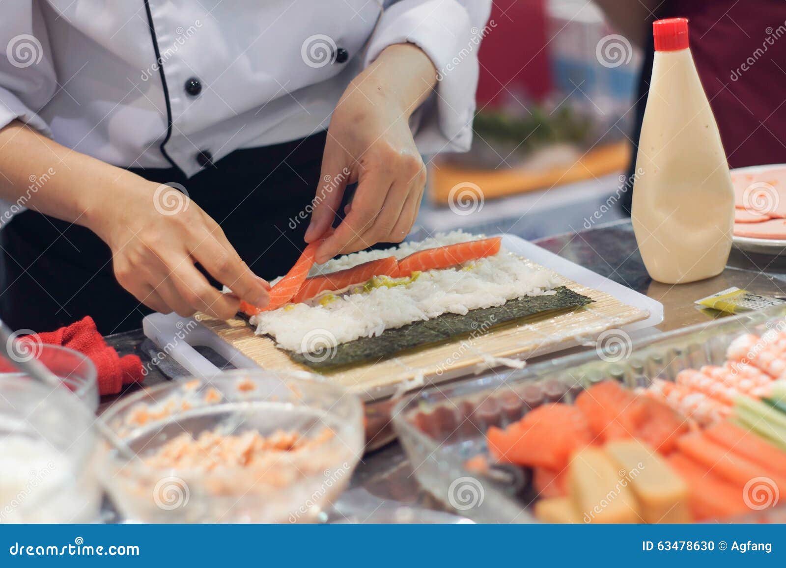 Chef making a sushi rolls stock photo. Image of japan - 63478630