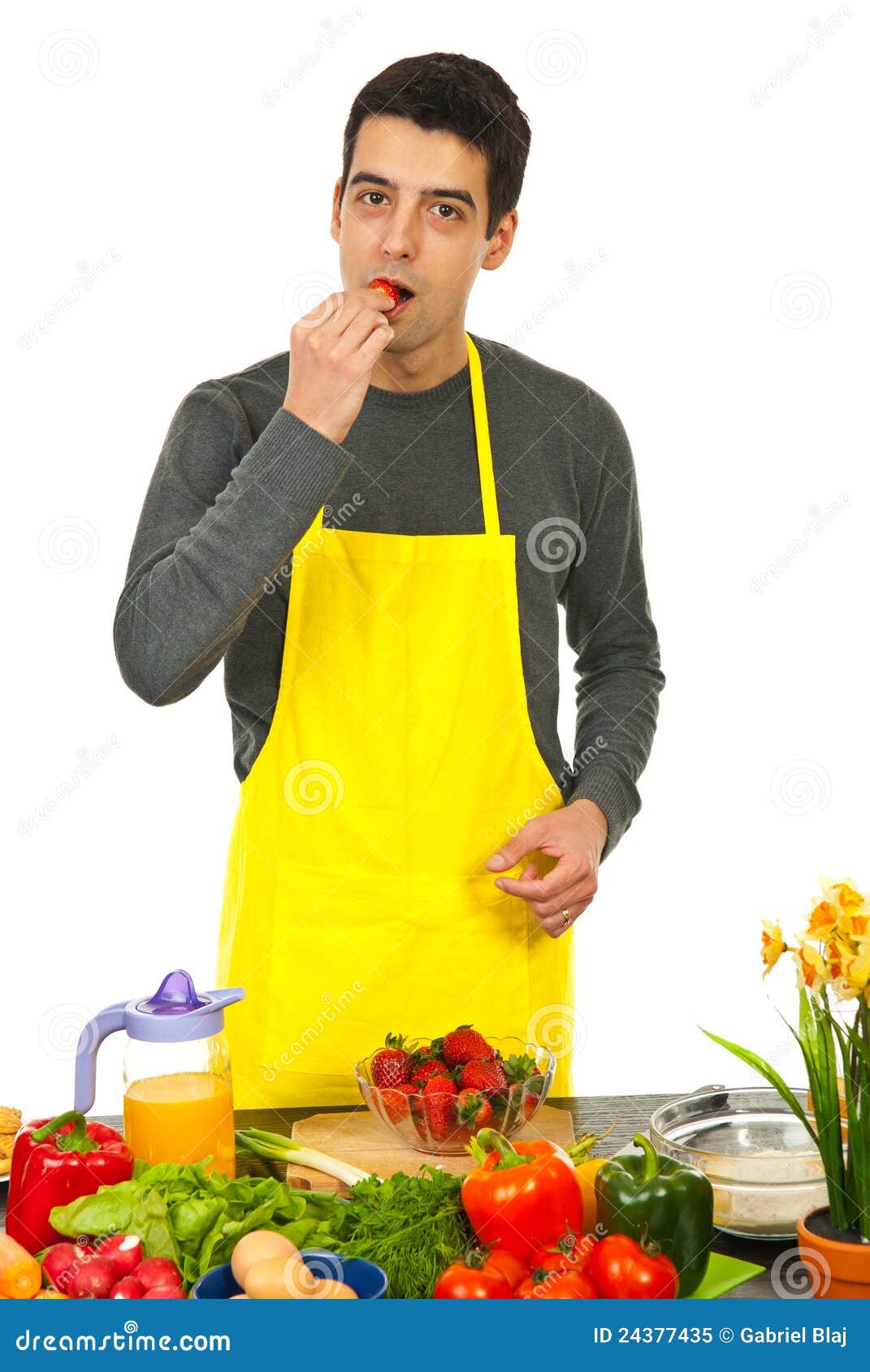 Chef Man Eating Strawberry in Kitchen Stock Image - Image of hold ...