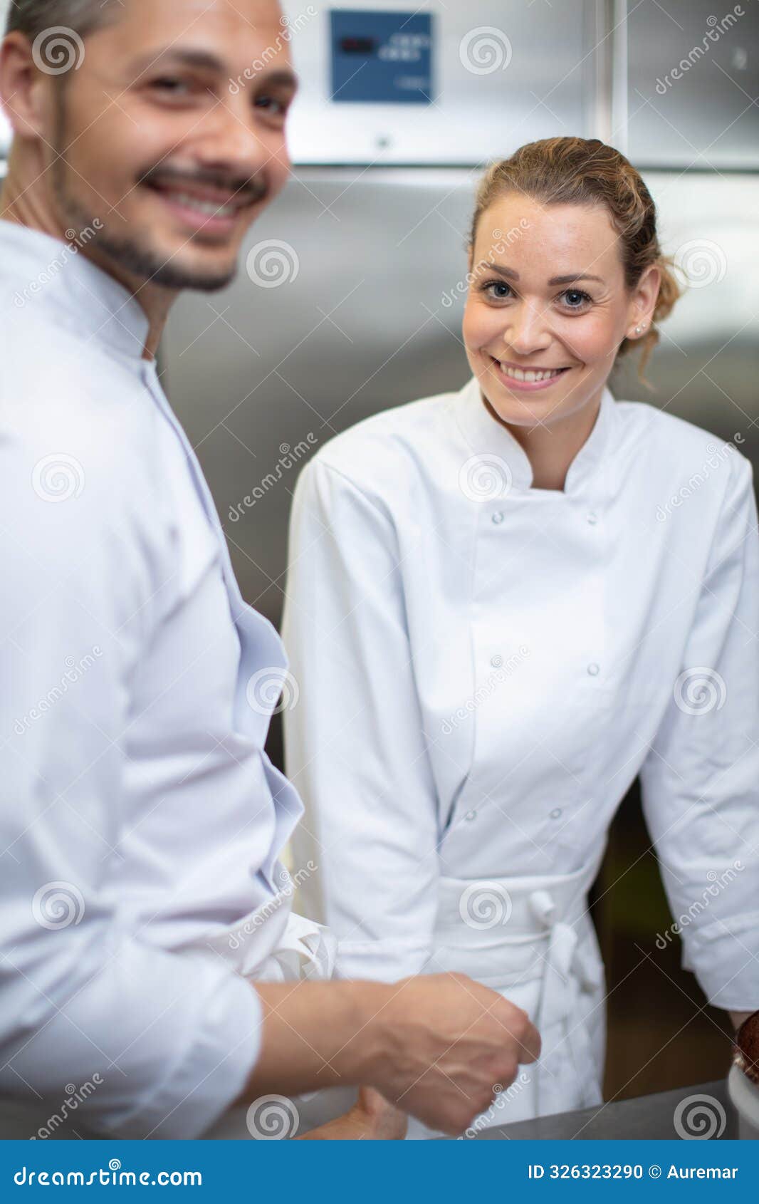 Chef Man and Woman Looking at Camera Stock Photo - Image of culinary ...