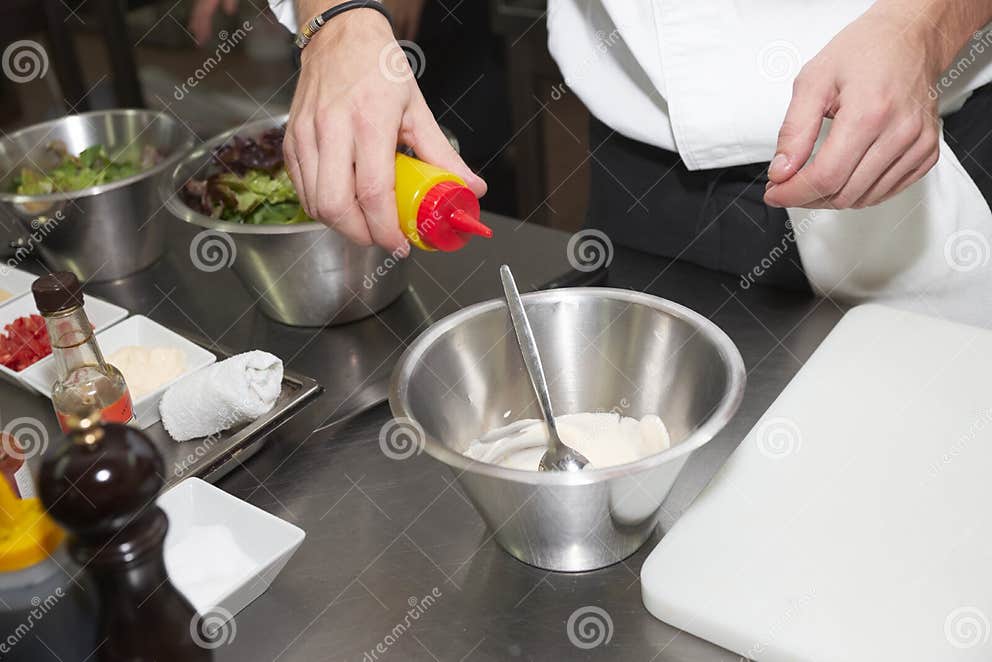 Chef is mixing ingredients stock image. Image of plate - 12420767
