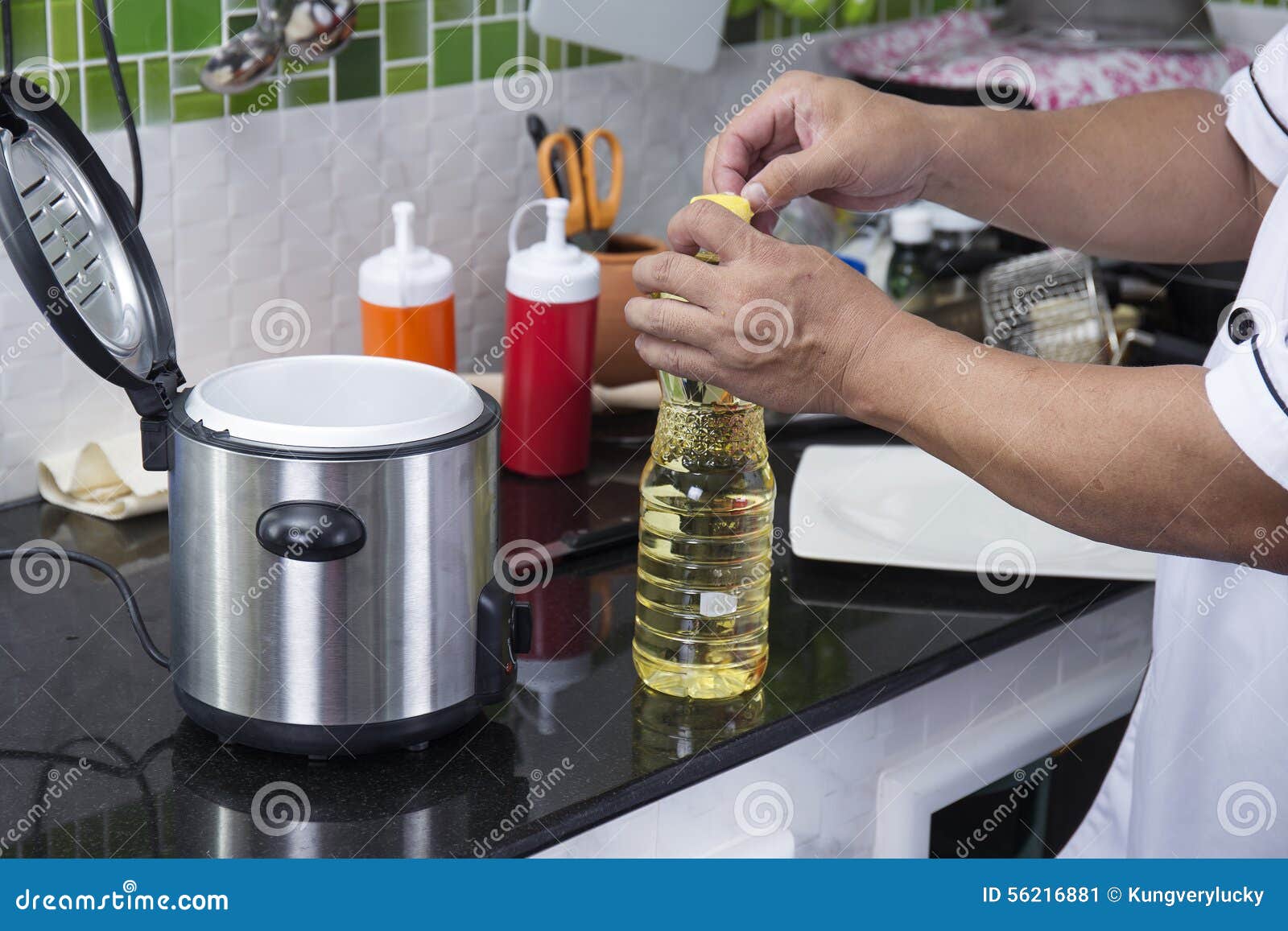 Chef Open Cap of Vegetable Oil Stock Image - Image of cooking, drop ...