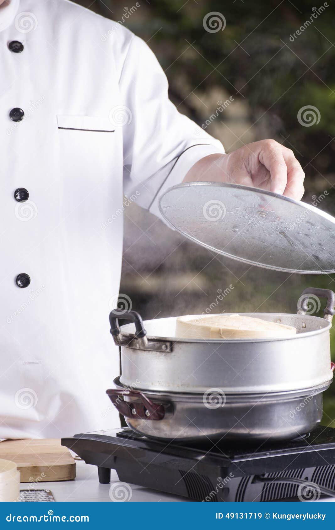 Chef opening the pot stock image. Image of preparation - 49131719