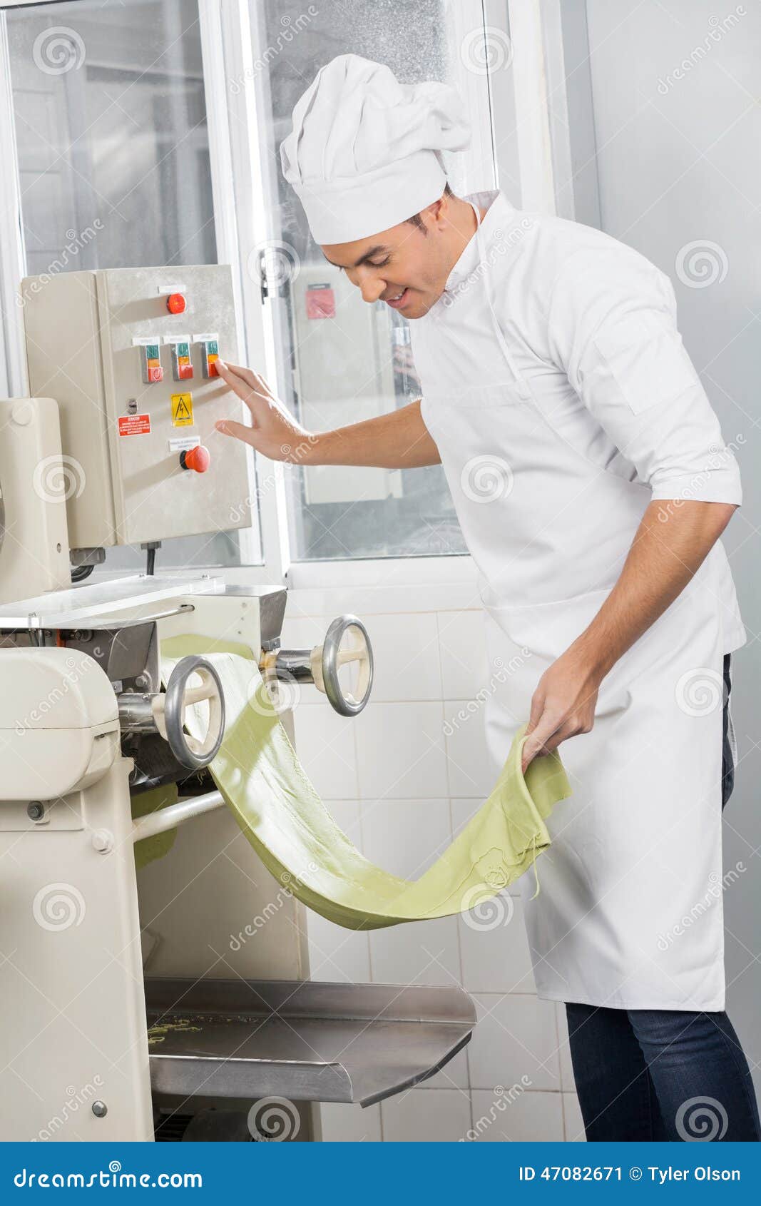 Chef Operating Spaghetti Pasta Machine Stock Image - Image of machinery ...