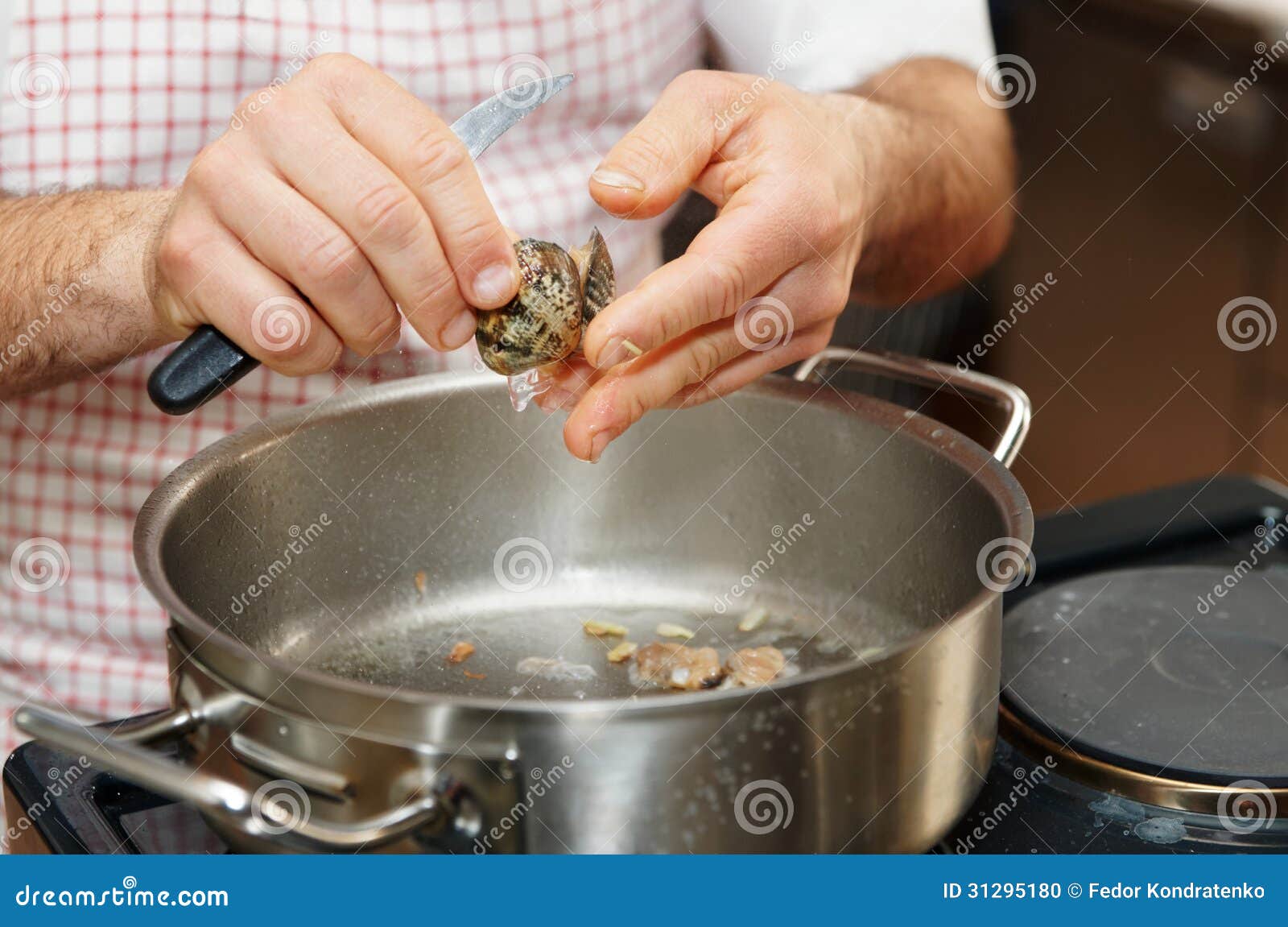 Chef is peeling clams stock photo. Image of cuisine, commercial - 31295180