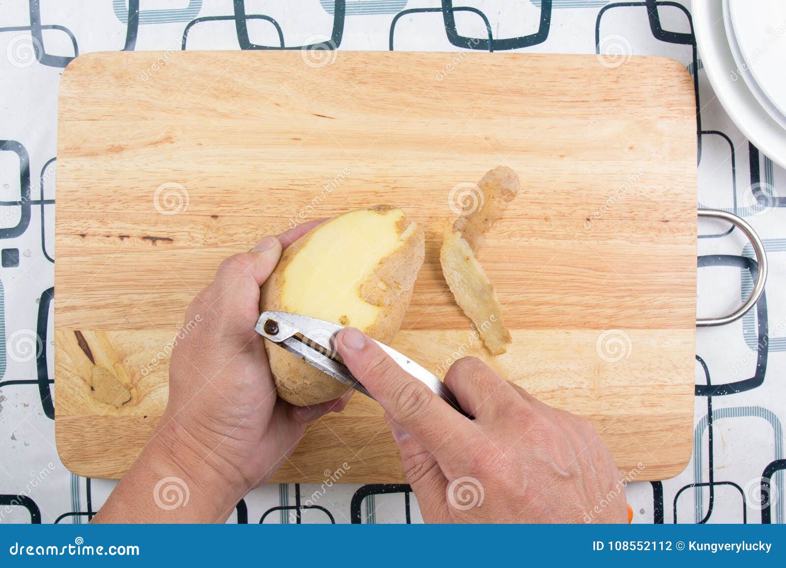 Chef peeling potato stock photo. Image of healthy, peeled - 108552112