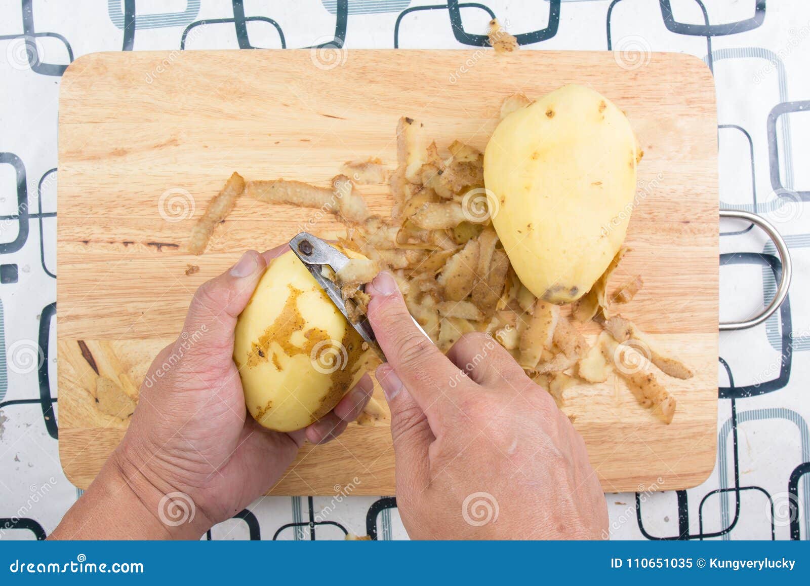 Chef peeling potato stock image. Image of prepare, plant - 110651035
