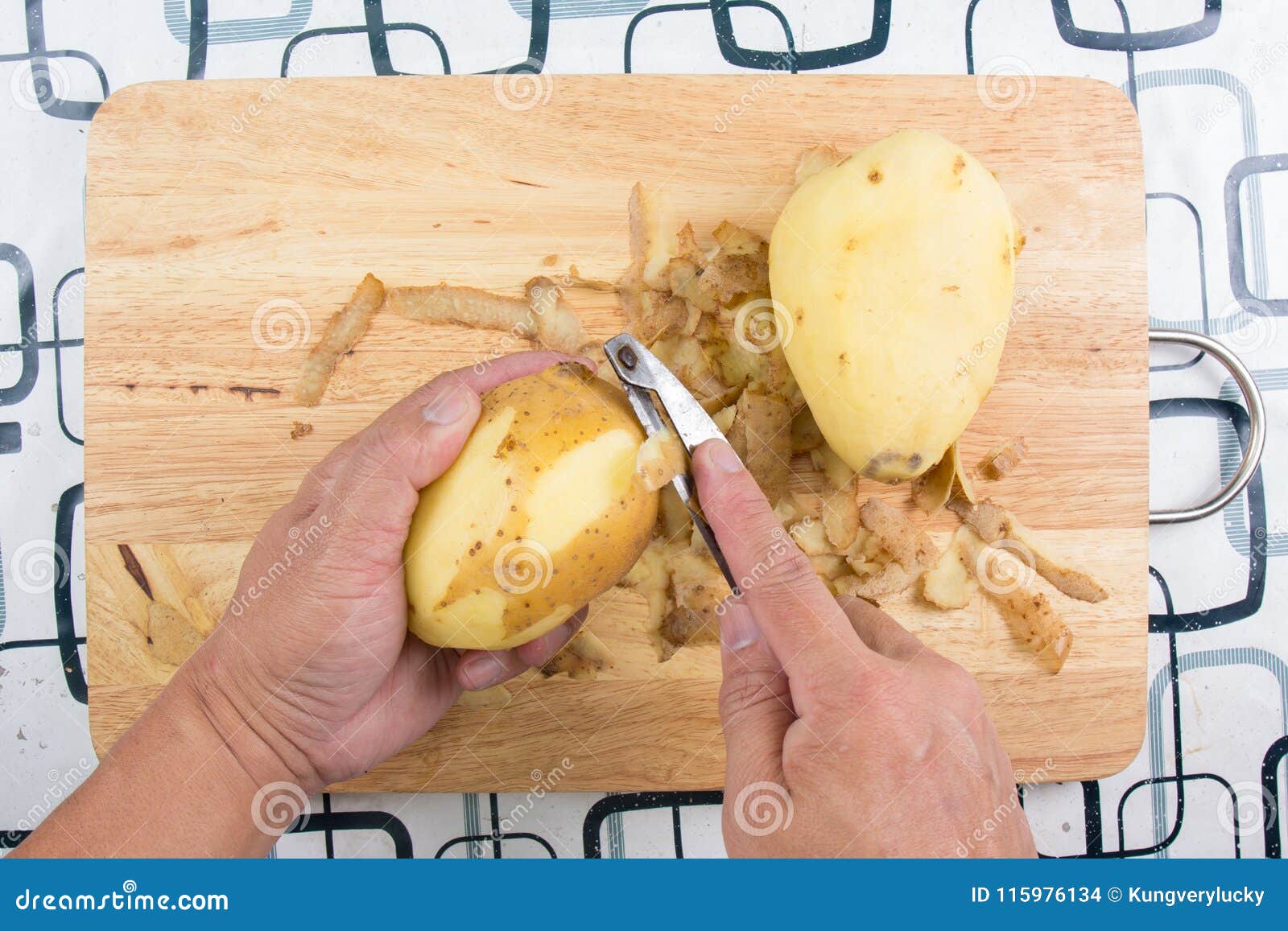 Chef peeling potato stock photo. Image of potatoes, closeup - 115976134