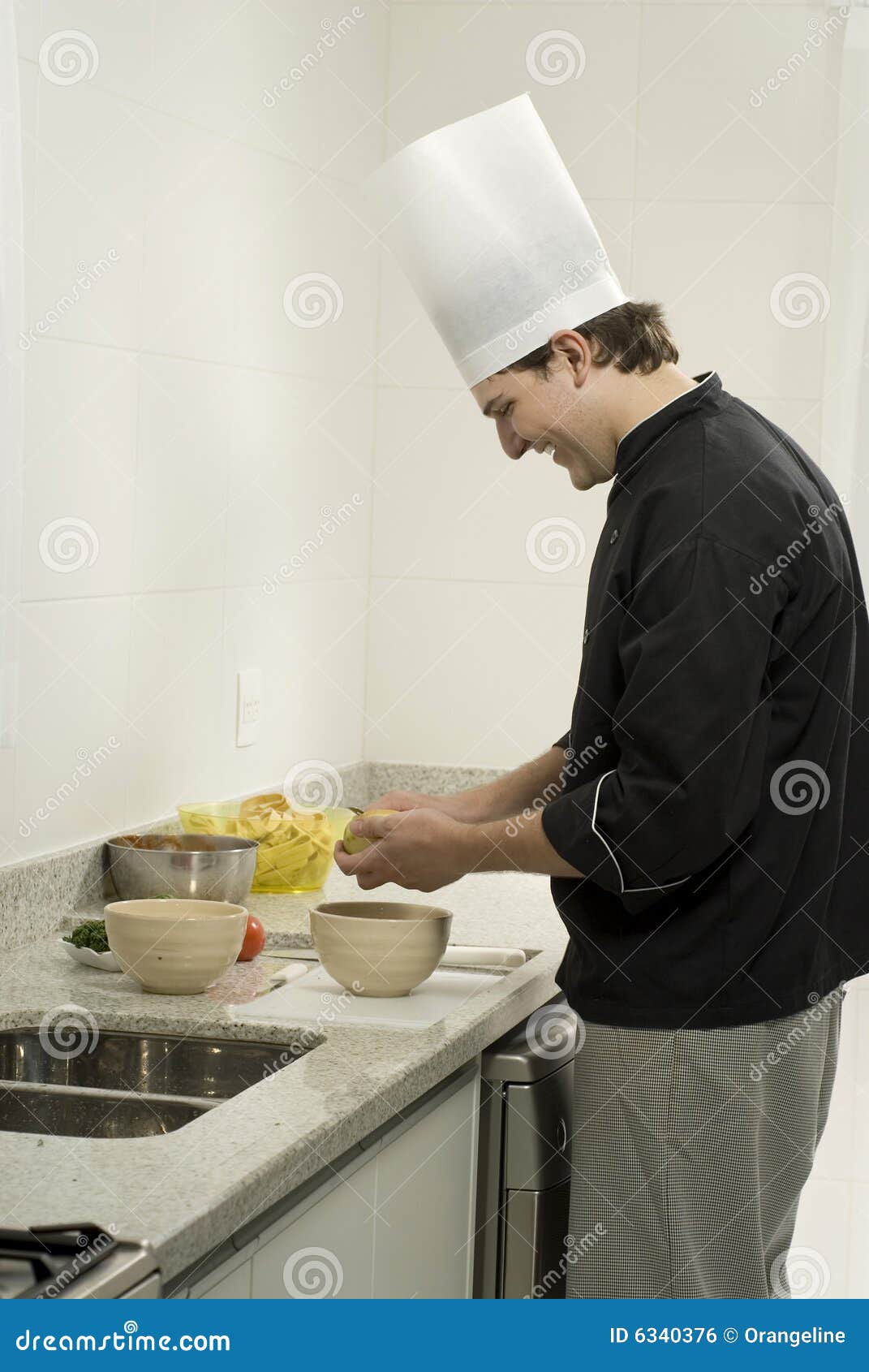 Chef Peeling Potatoes stock photo. Image of chef, culinary - 6340376