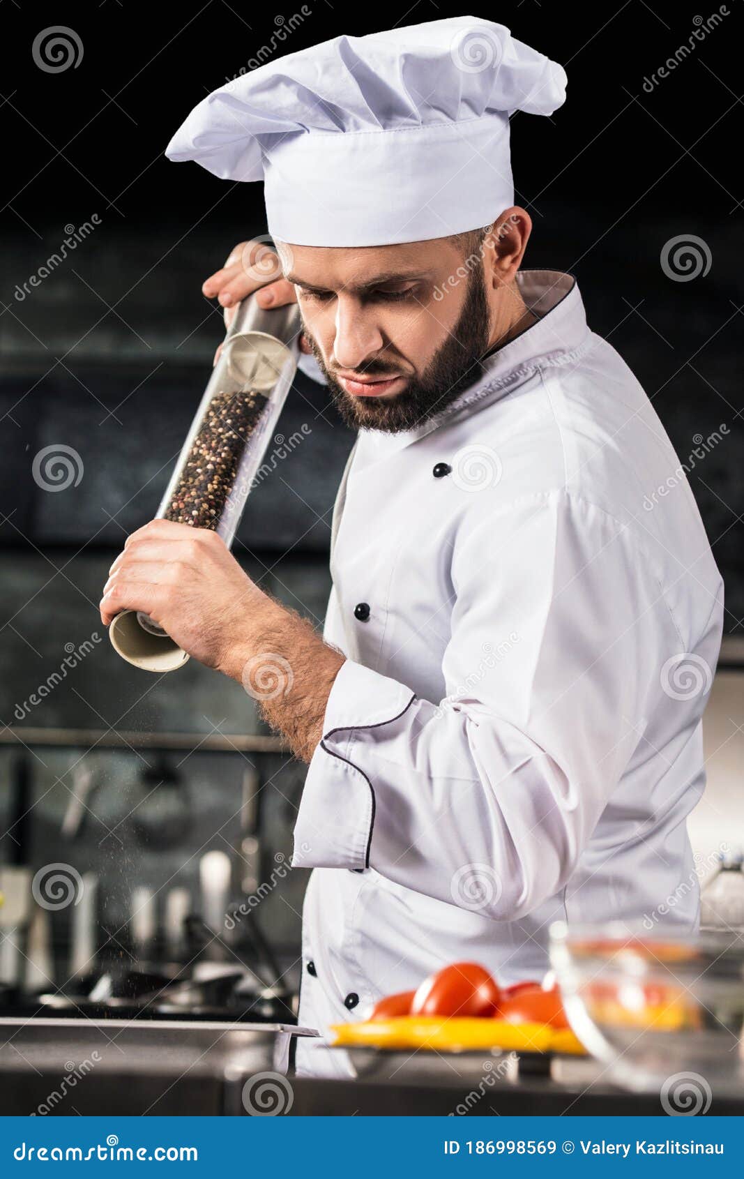 Chef with Pepperbox at Kitchen Restaurant. Portrait of Chef with ...