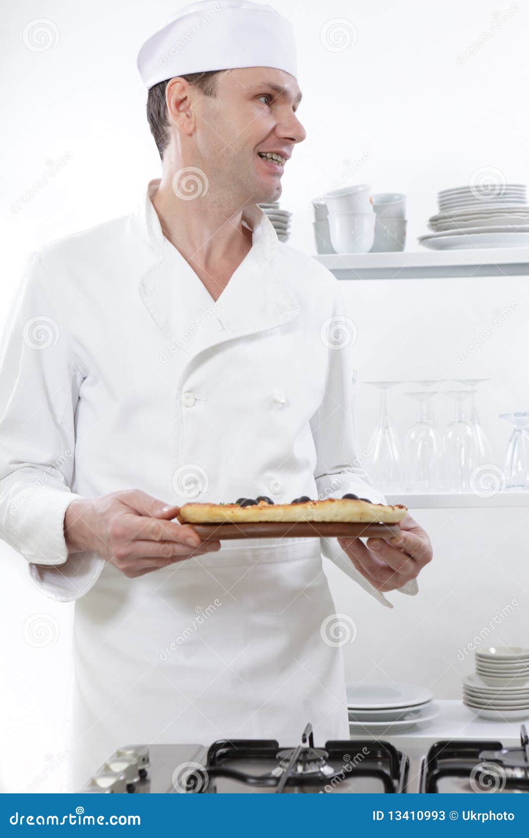 Chef with pizza stock image. Image of cook, rack, black - 13410993