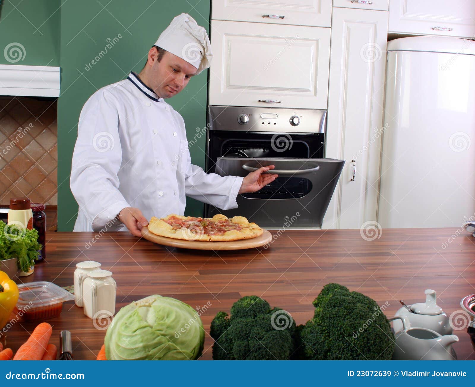 Chef and pizza stock image. Image of busy, cooking, restaurant - 23072639