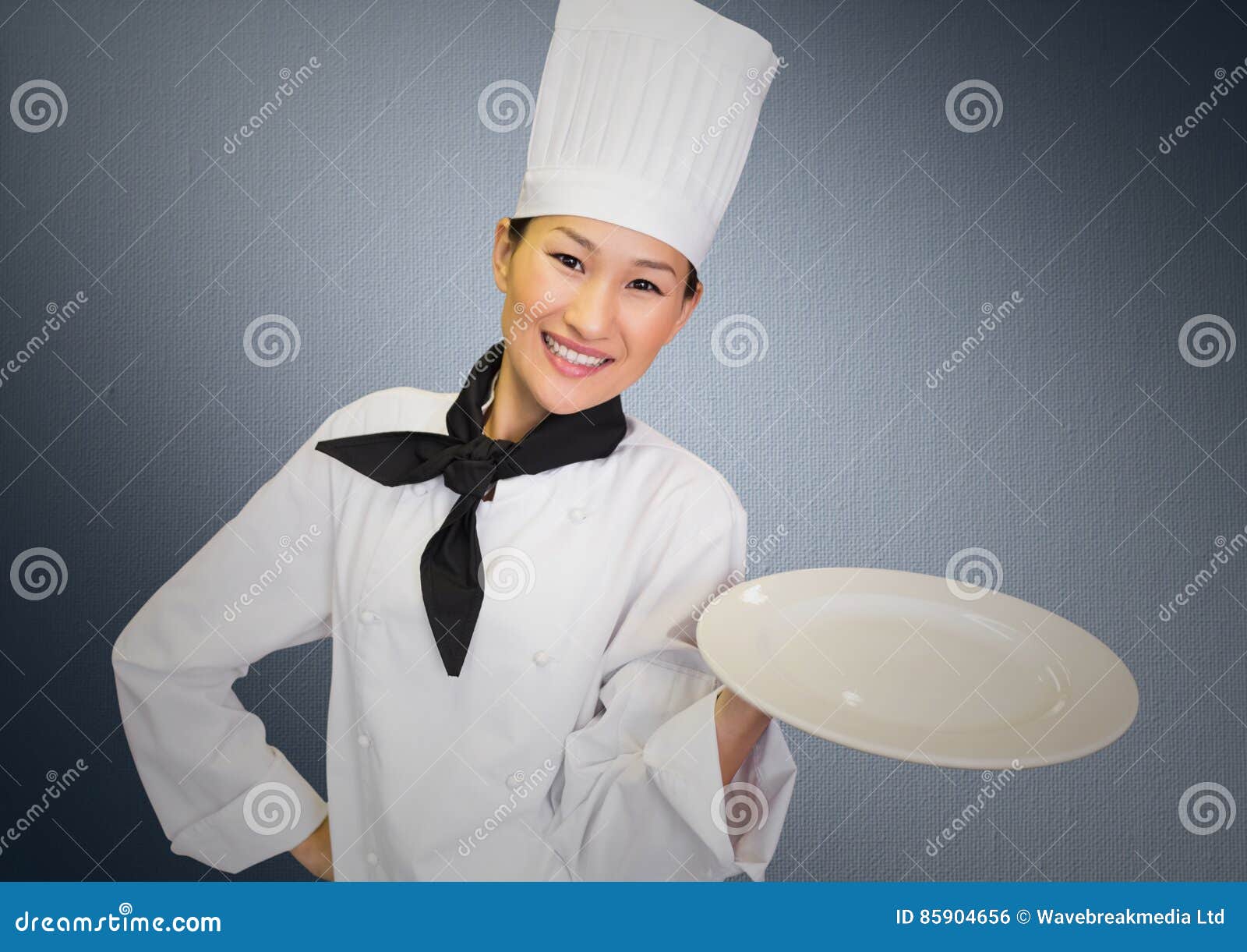 Chef with Plate Against Grey Background Stock Photo - Image of folded ...