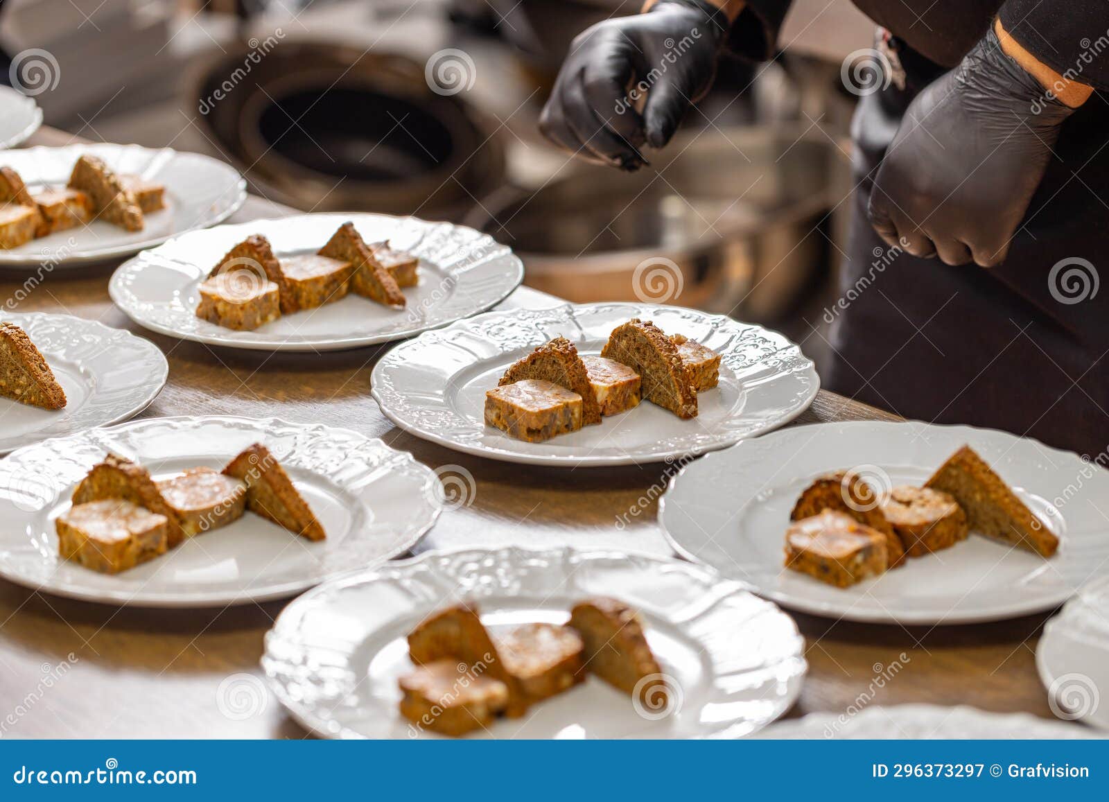 Chef Plating Slices of Toasted Bread and Ground Meat Stock Image ...