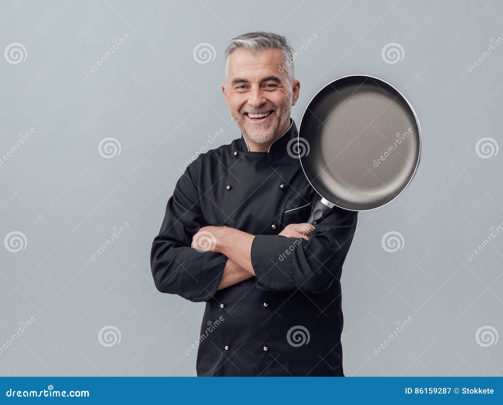 Chef posing with a pan stock image. Image of occupation - 86159287