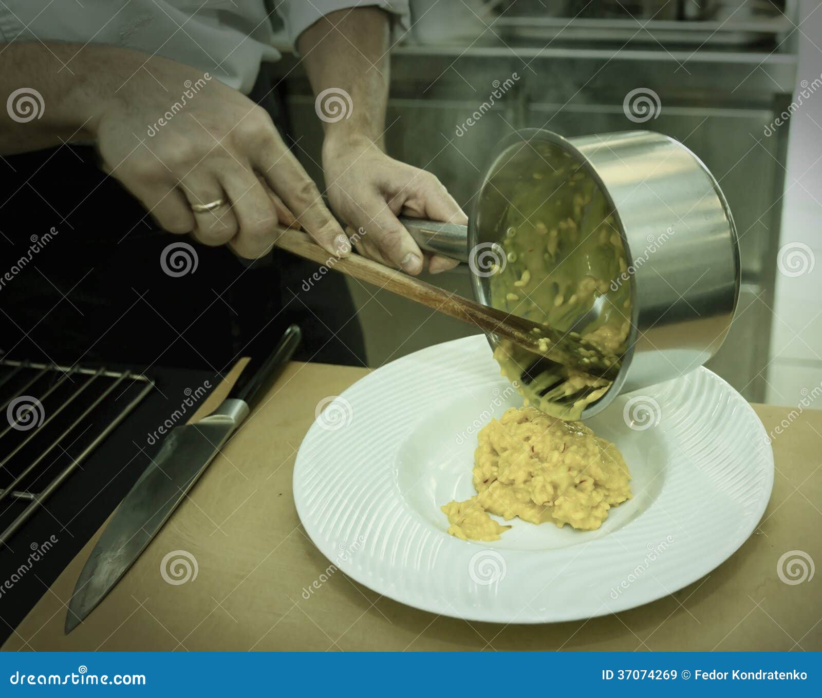 Chef is Potting Risotto on Plate Stock Image - Image of industry ...