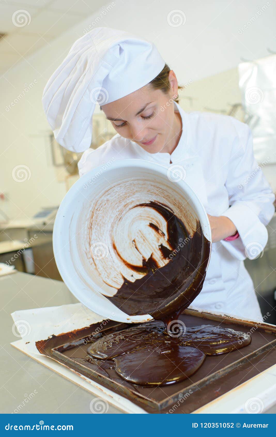 Chef Pouring Chocolate into Baking Sheet Stock Photo - Image of female ...