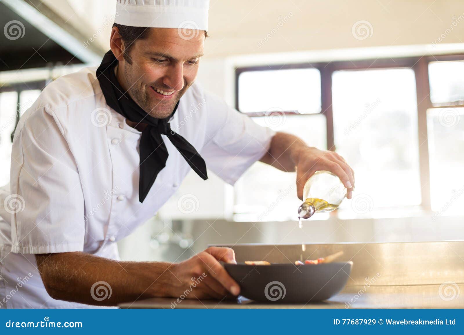 Chef Pouring Olive Oil on Meal Stock Image - Image of chefs, food: 77687929