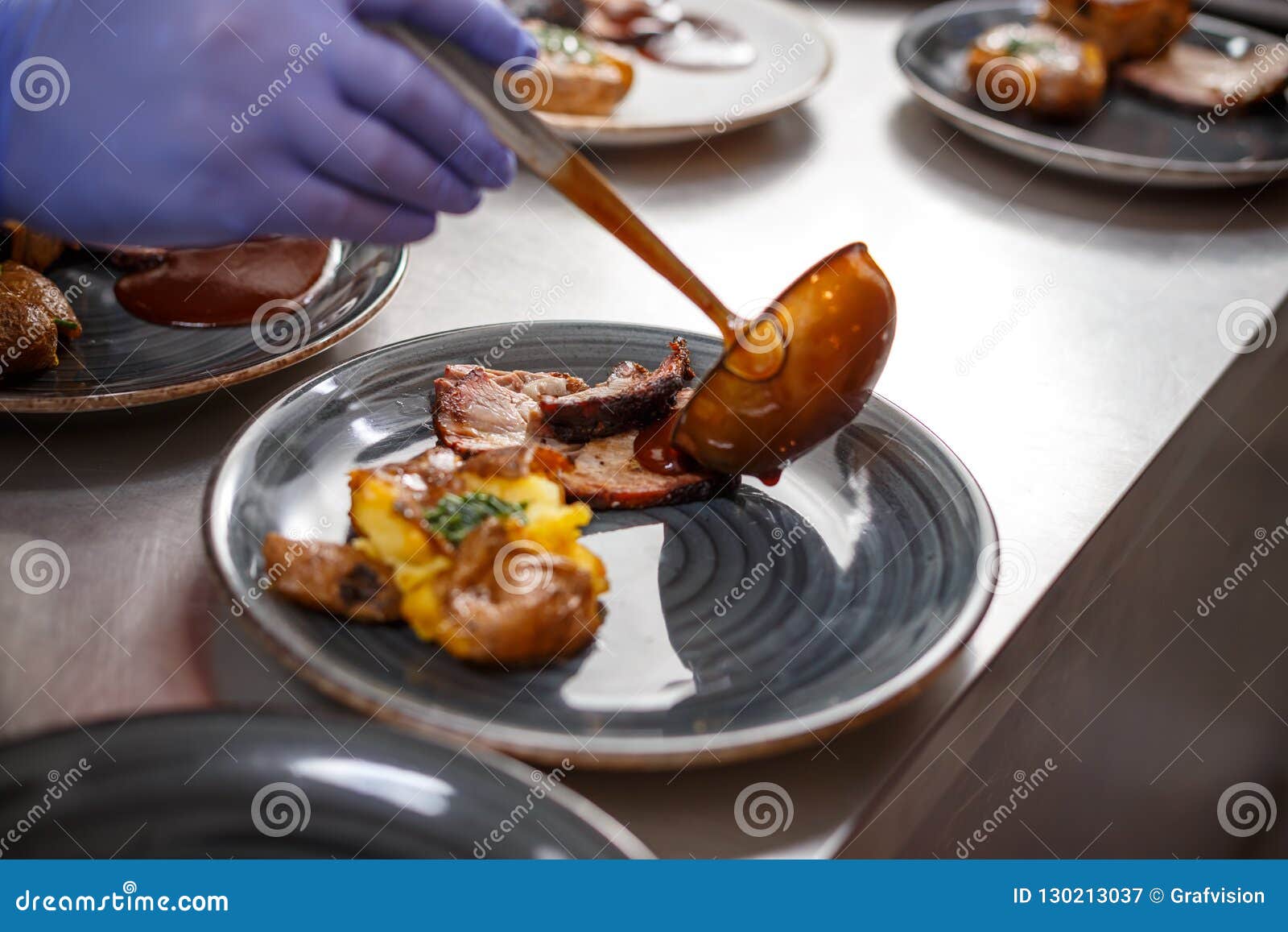 Chef pouring sauce stock image. Image of garnish, pour - 130213037