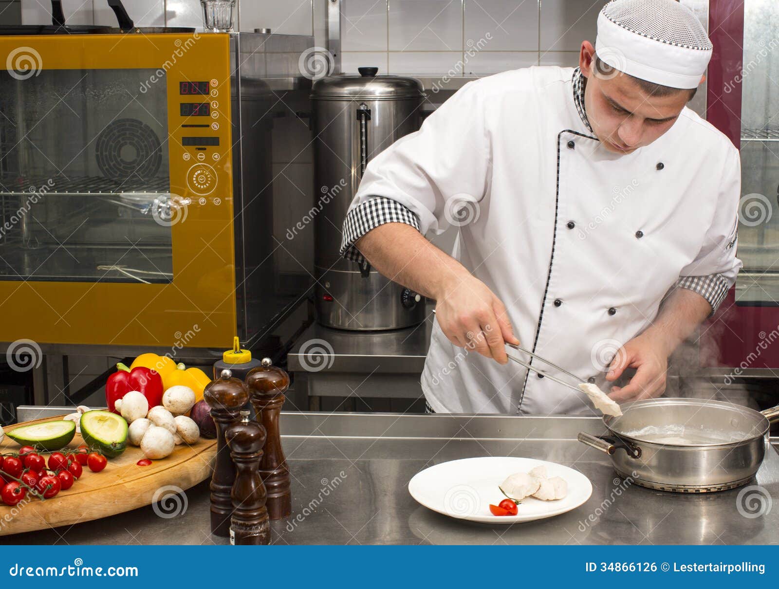 Chef prepares a meal stock photo. Image of middle, smiling - 34866126