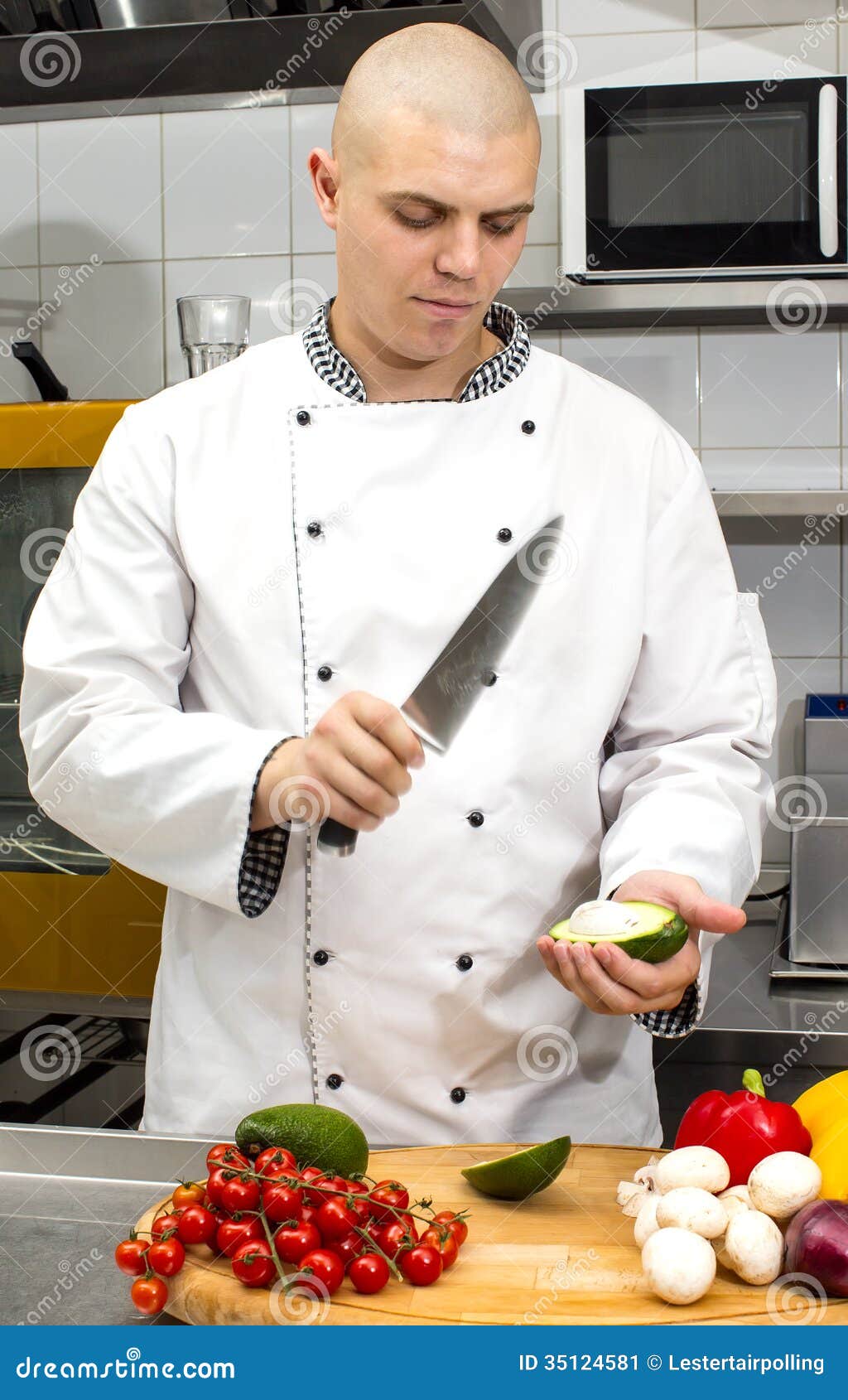 Chef prepares a meal stock image. Image of smiling, plate - 35124581