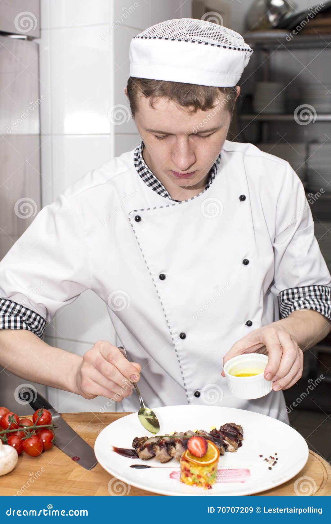 Chef prepares a meal stock image. Image of trainee, male - 70707209