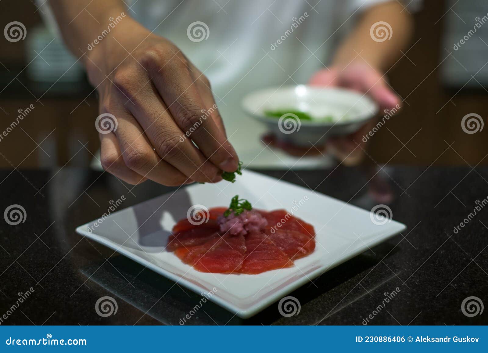 The Chef Prepares Tuna Sashimi. the Process of Making and Decorating ...