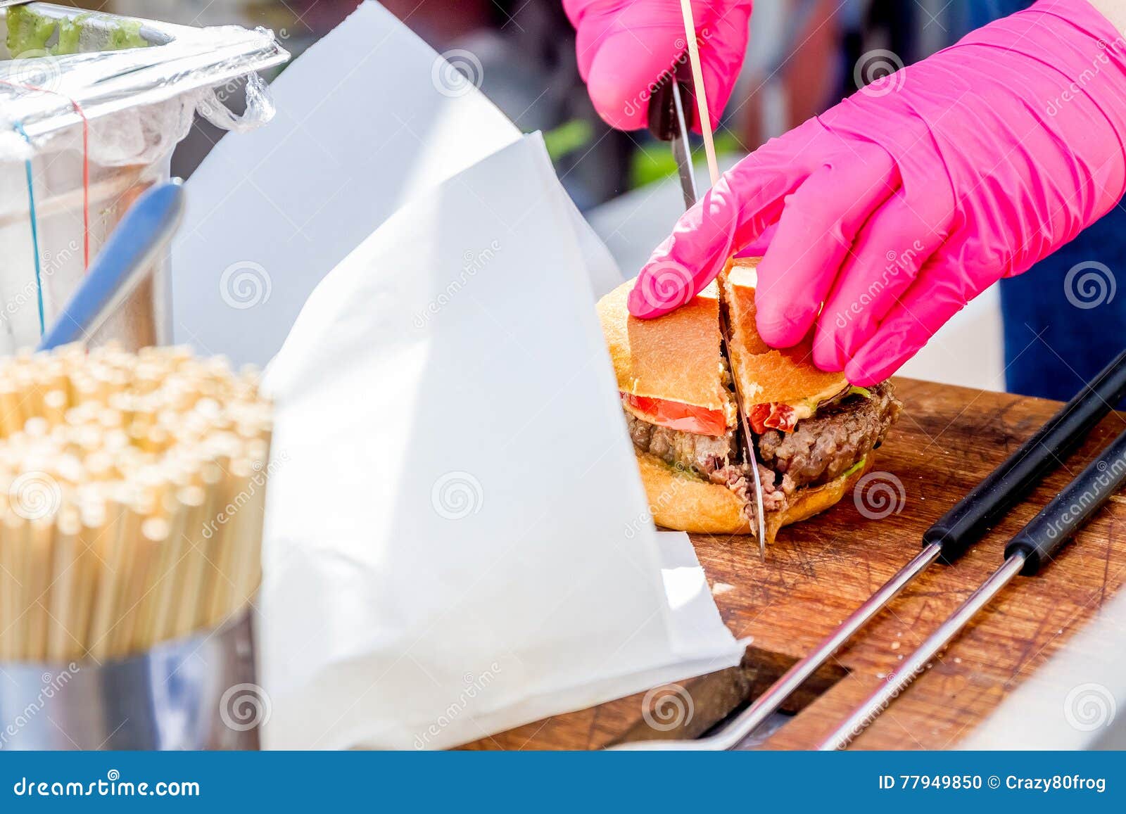 Chef preparing a burger stock photo. Image of cafe, cooking - 77949850