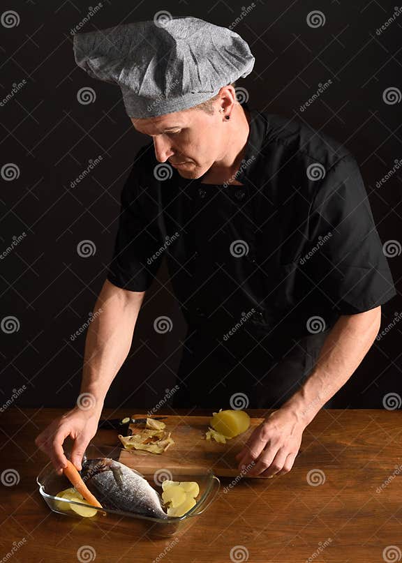 Chef Preparing a Fish Dish with Garnish Stock Image - Image of dressing ...
