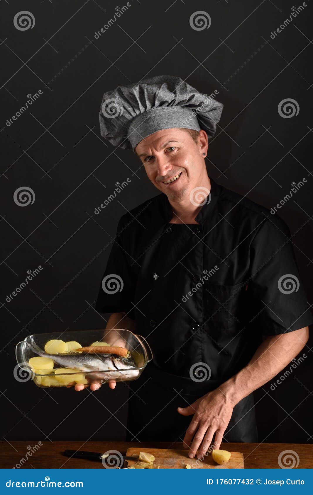 Chef Preparing a Fish Dish with Garnish Stock Photo - Image of ...