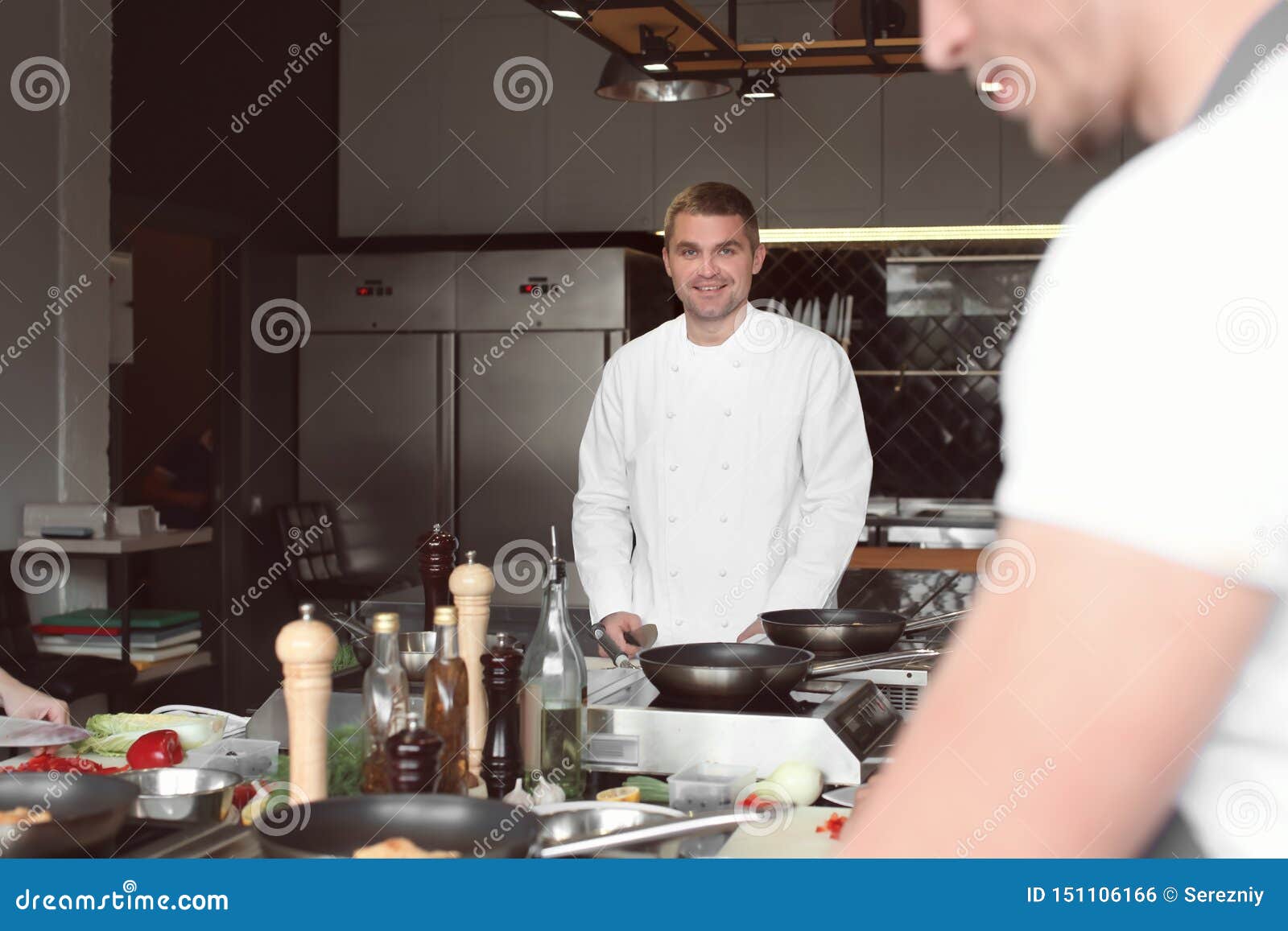Chef Preparing Meal during Cooking Classes in Restaurant Kitchen Stock ...