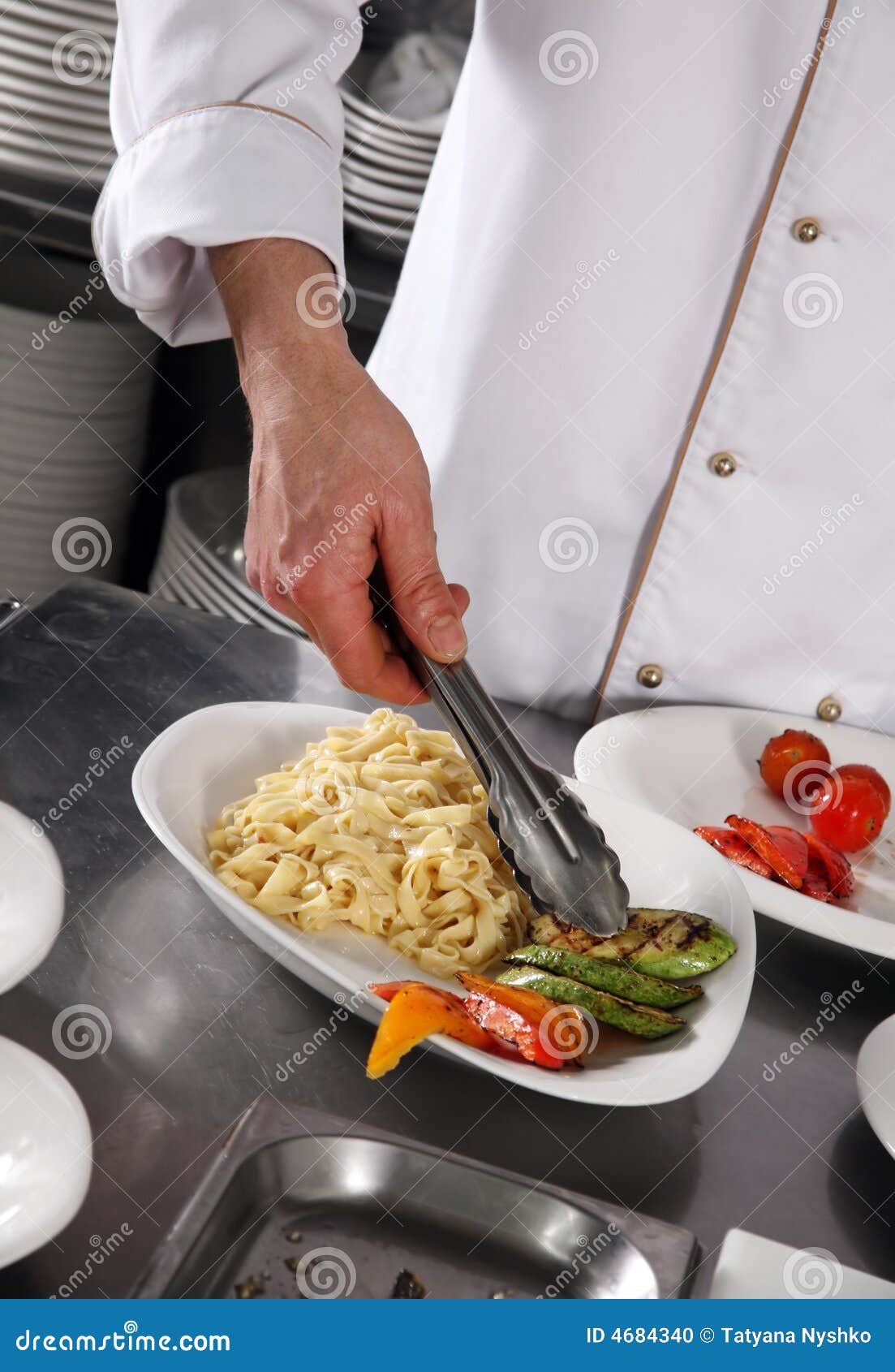 Chef preparing pasta stock photo. Image of commercial - 4684340
