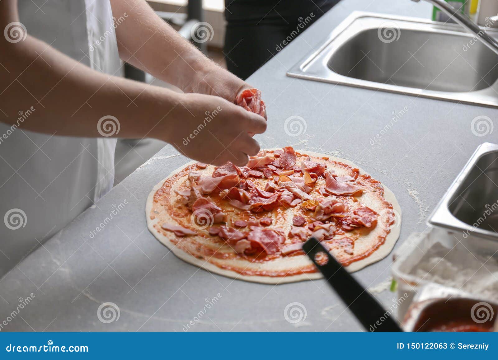 Chef Preparing Pizza on Table in Restaurant Kitchen Stock Image - Image ...