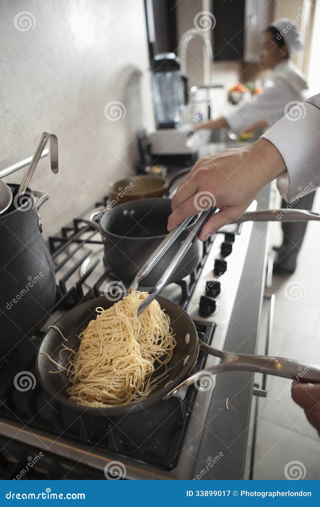Chef Preparing Spaghetti in Kitchen Stock Image - Image of occupation ...