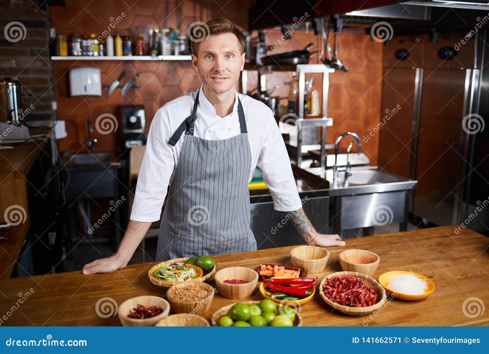 Chef Preparing Spicy Dish stock image. Image of dining - 141662571