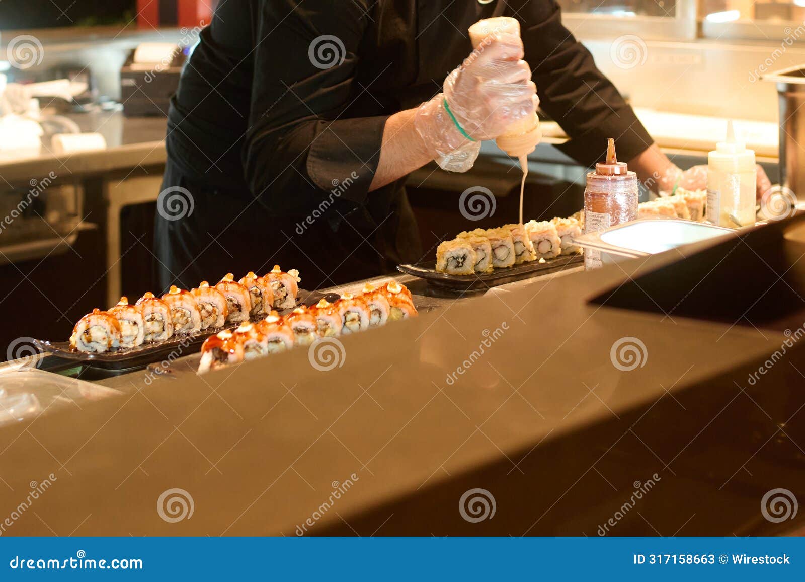 Chef Preparing Sushi in a Restaurant Kitchen Stock Image - Image of chef, professional: 317158663