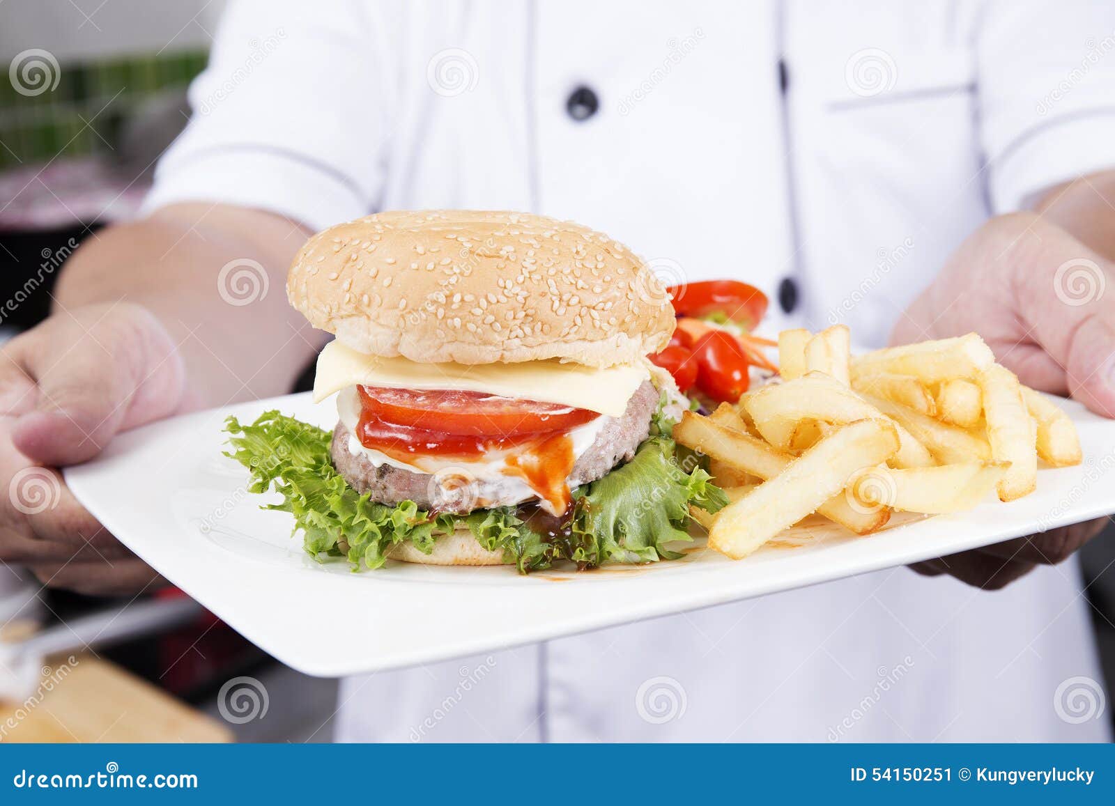 Chef Presented Plate of Hamburger Stock Image - Image of fries, green ...